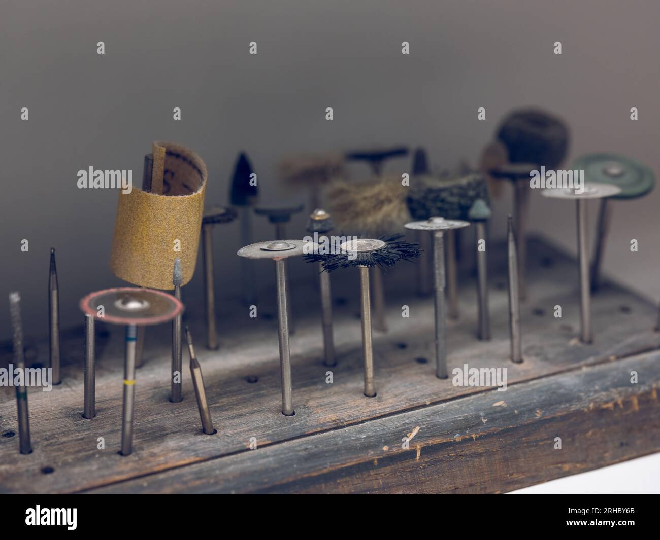 From above closeup of set of various metal professional dental burs for ...