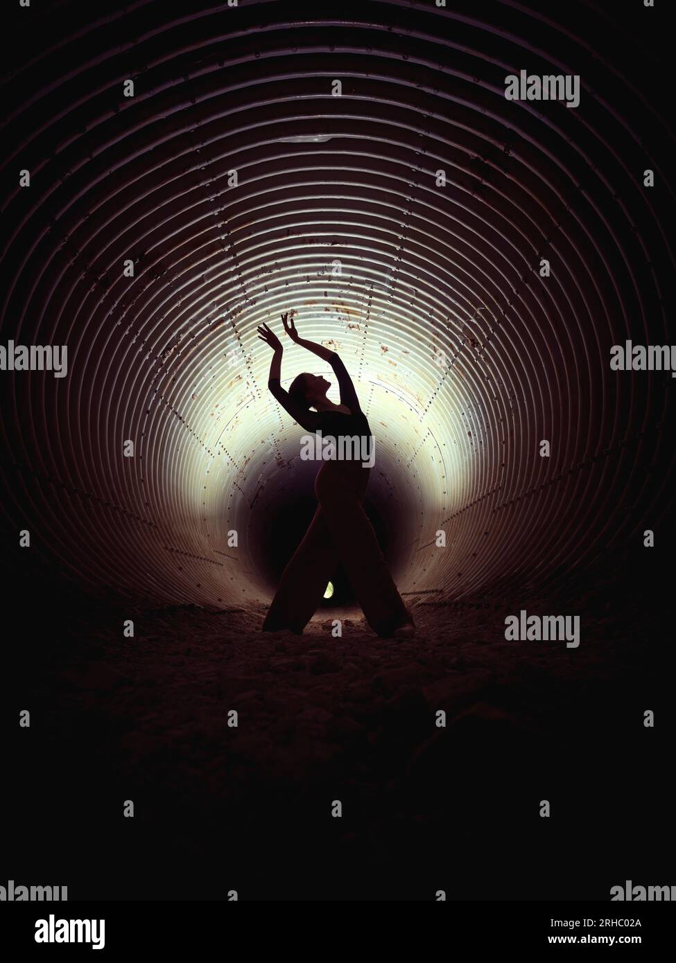 Full body of talented female ballet dancer in pointe shoes dancing in ...