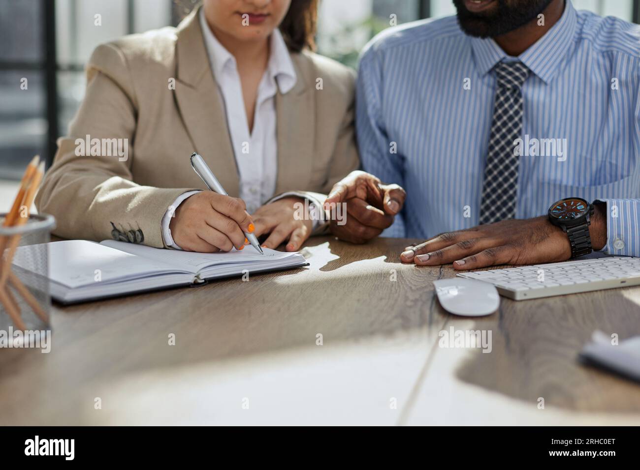 Financial advisor asking for womans signature for insurance, legal ...