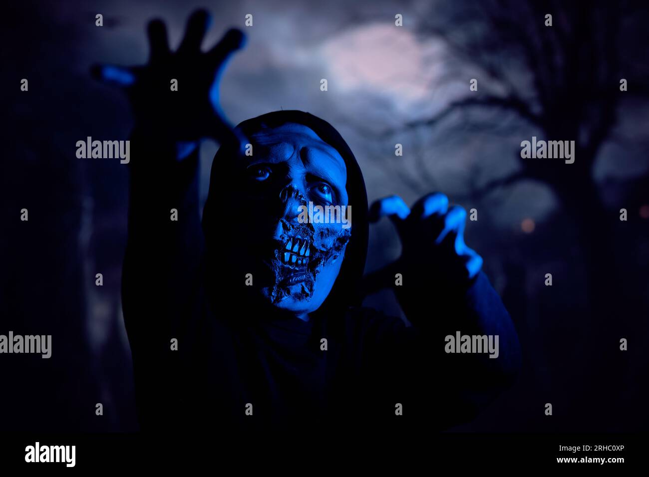 Creepy monster reaching out camera with claw like hands while sneaking ...