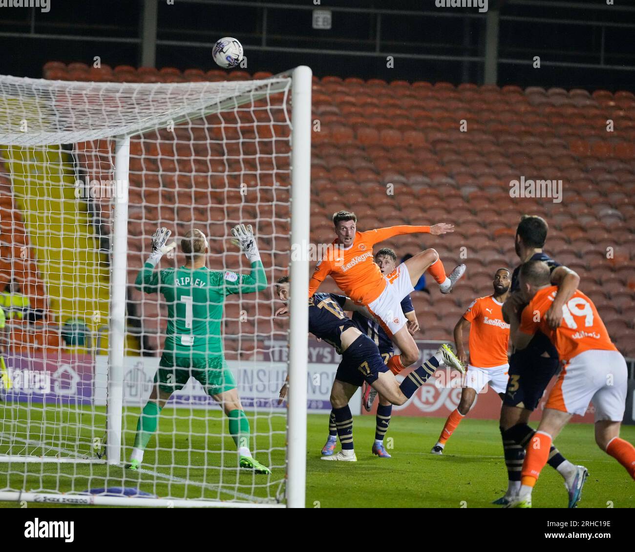 Jake Beesley #18 of Blackpool heads over the bar during the Sky Bet ...