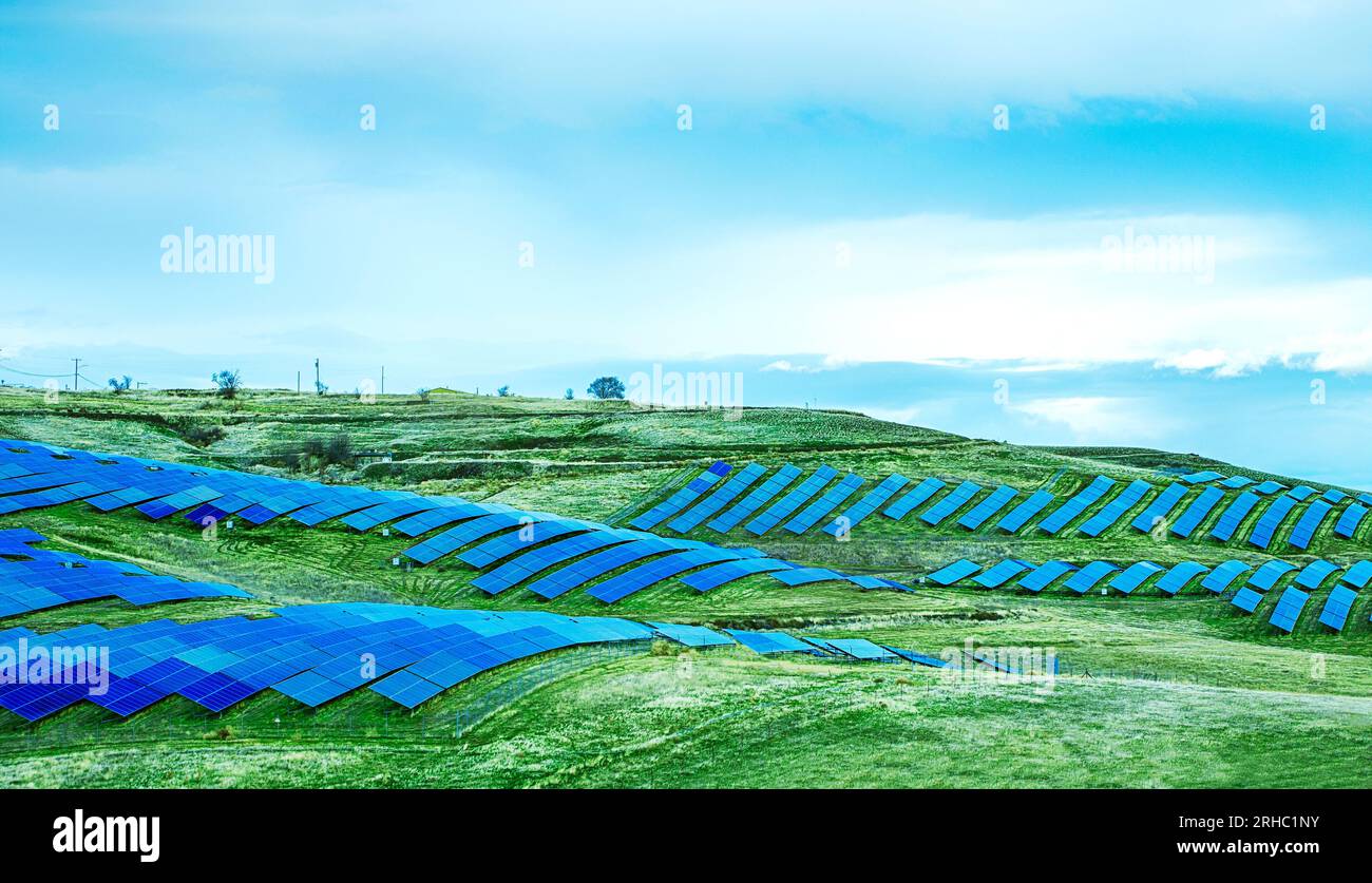 Rows of photovoltaic solar panels in rural landscape, USA Stock Photo ...
