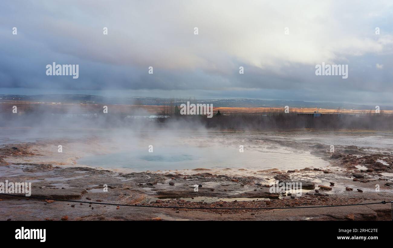 Icelandic geyser in panoramic scenery near reykjavik, holes erupting ...