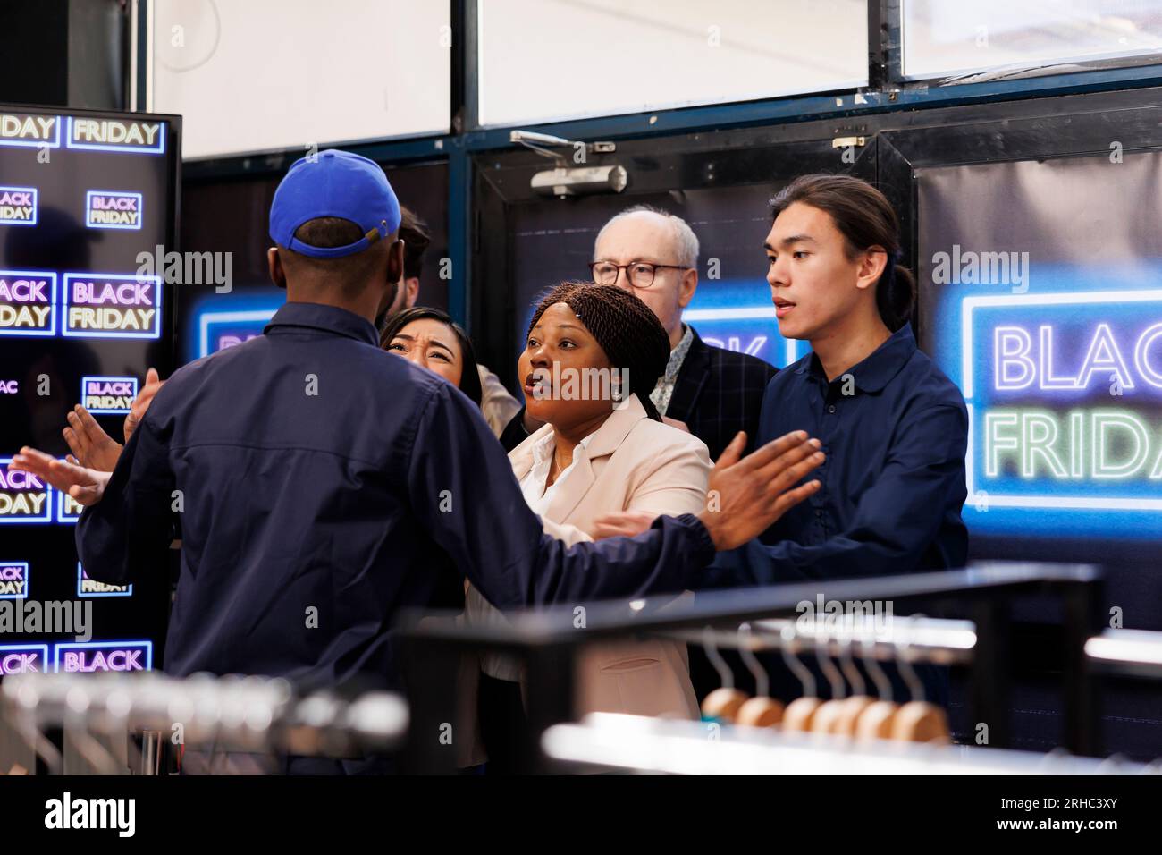 Holding back agressive man hi-res stock photography and images - Alamy