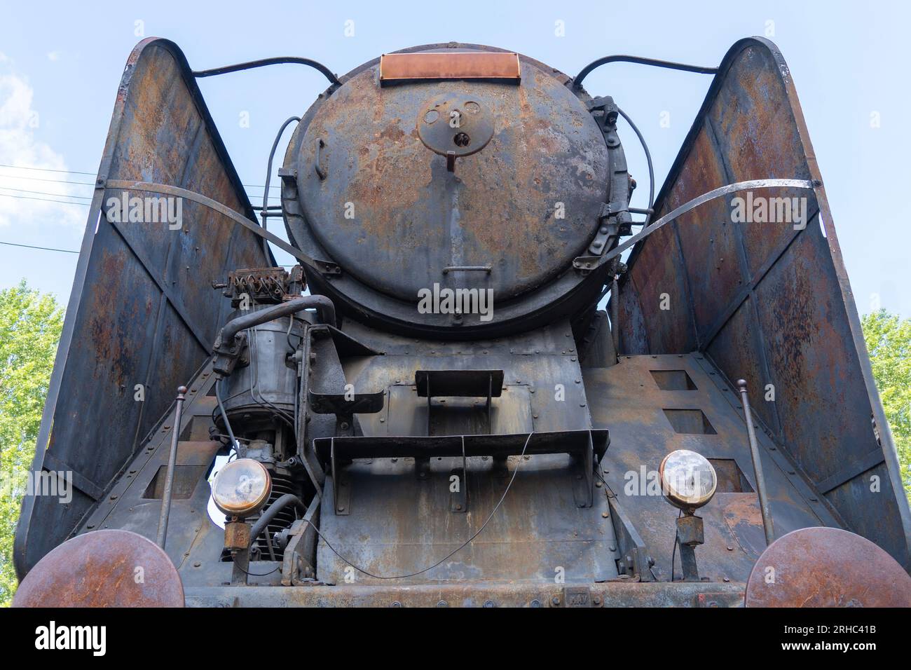 The front of an old black rusty steam locomotive from below Stock Photo ...