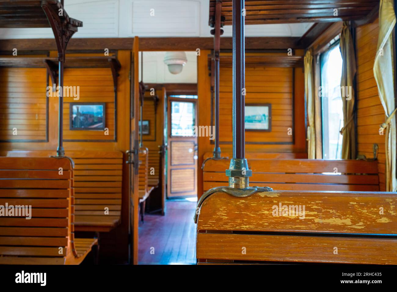 Interior of an old wooden covered railway car with wooden seats Stock ...