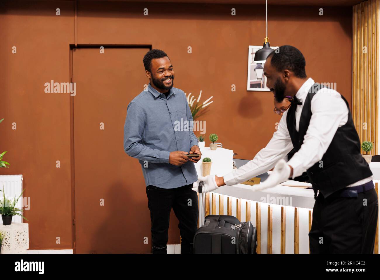 Bellhop uniform hi-res stock photography and images - Alamy