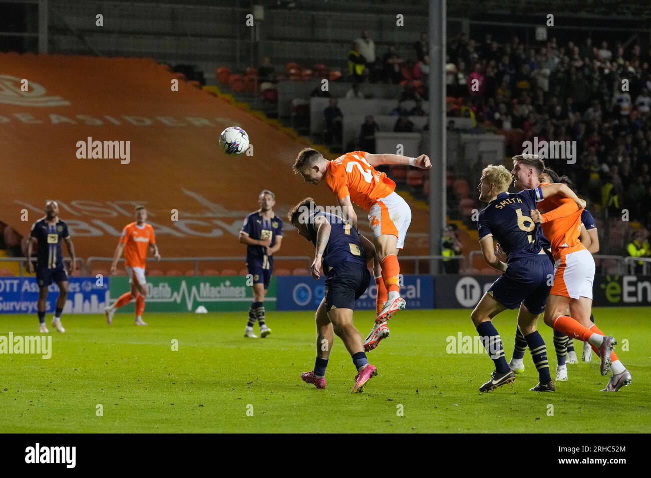 Blackpool, UK. 15th Aug, 2023. Andy Lyons #24 of Blackpool beats ...