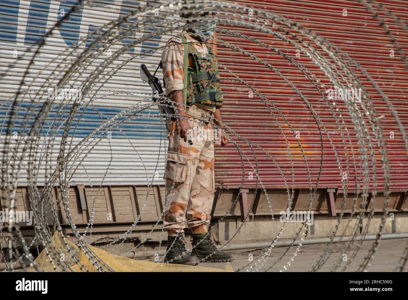 Srinagar, India. 15th Aug, 2023. Indian paramilitary trooper stands ...