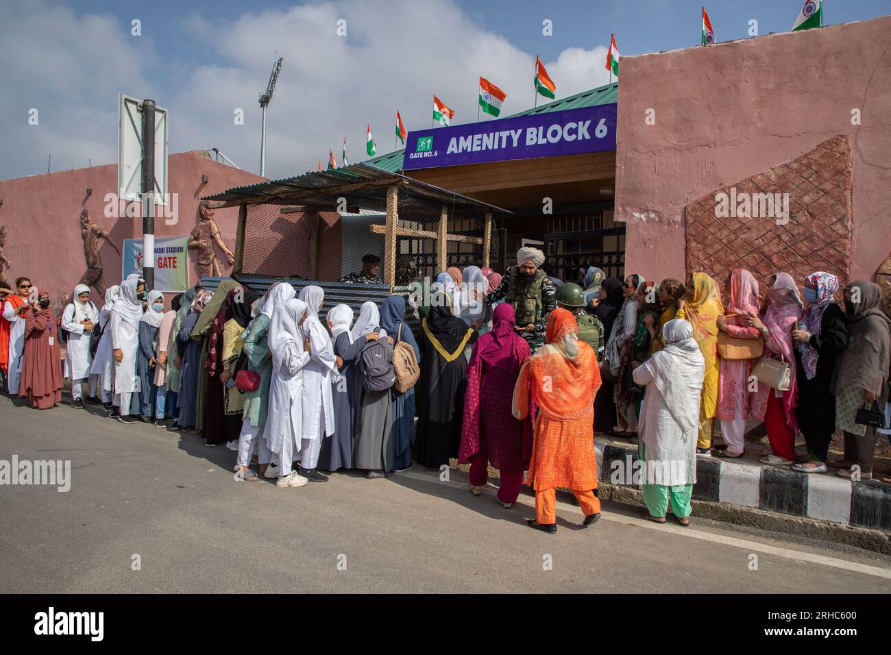 Srinagar, India. 15th Aug, 2023. People wait to enter the venue of ...
