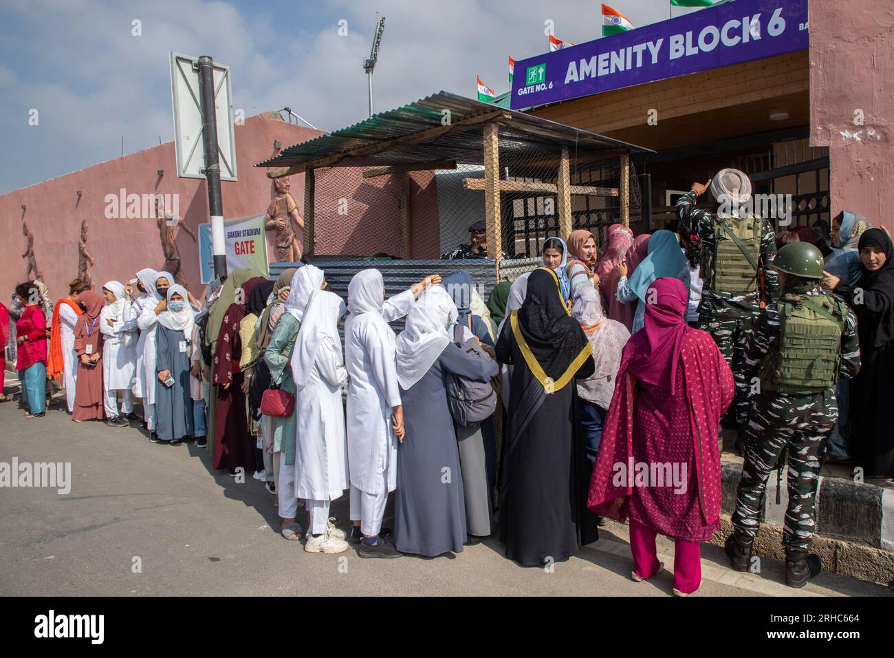 Srinagar, India. 15th Aug, 2023. People wait to enter the venue of ...
