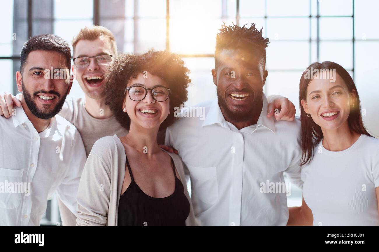 Smiling professional business leaders and employees group team portrait ...