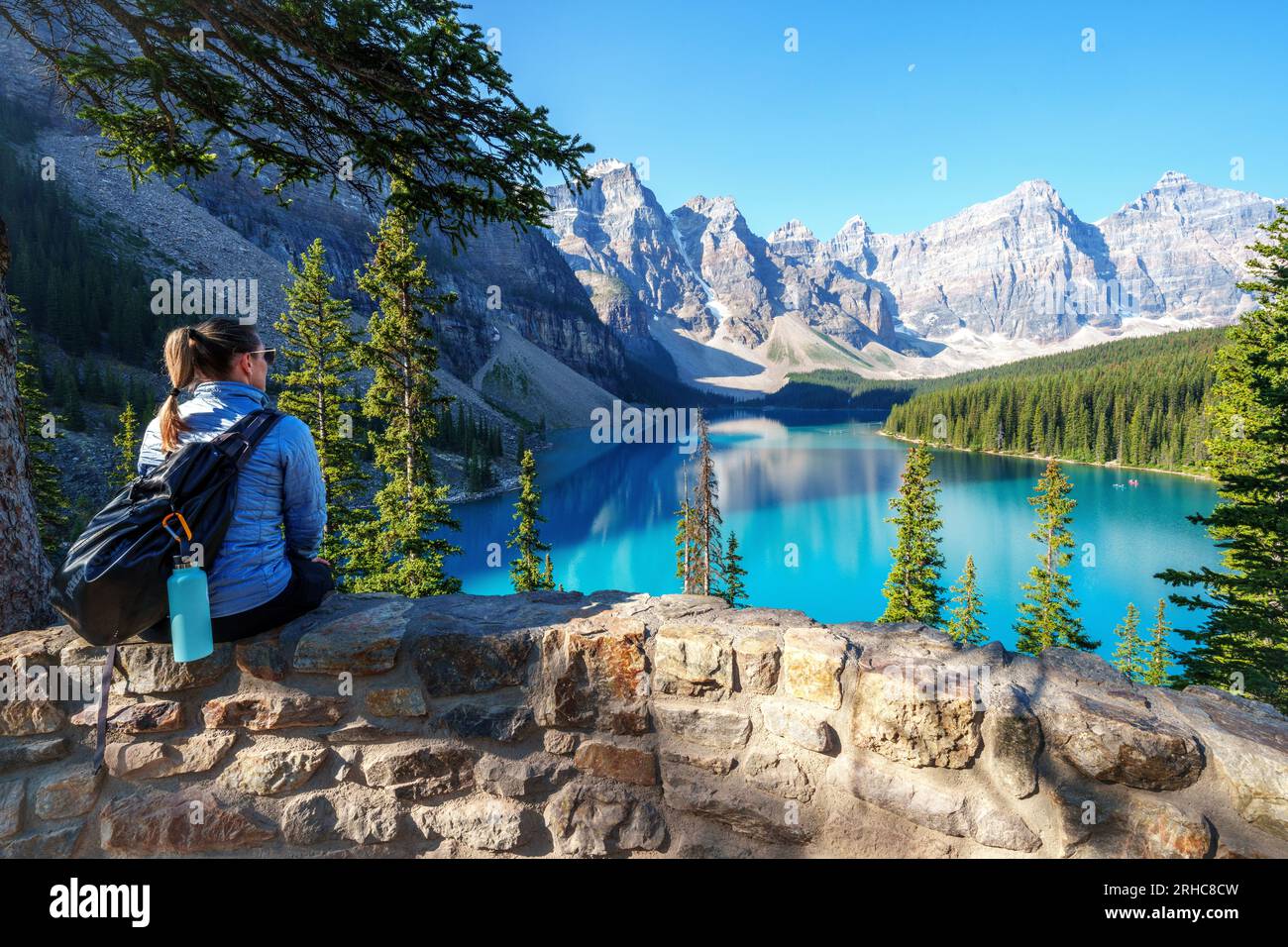 Female Hiker enjoying the Views over Moraine Lake during summer morning ...