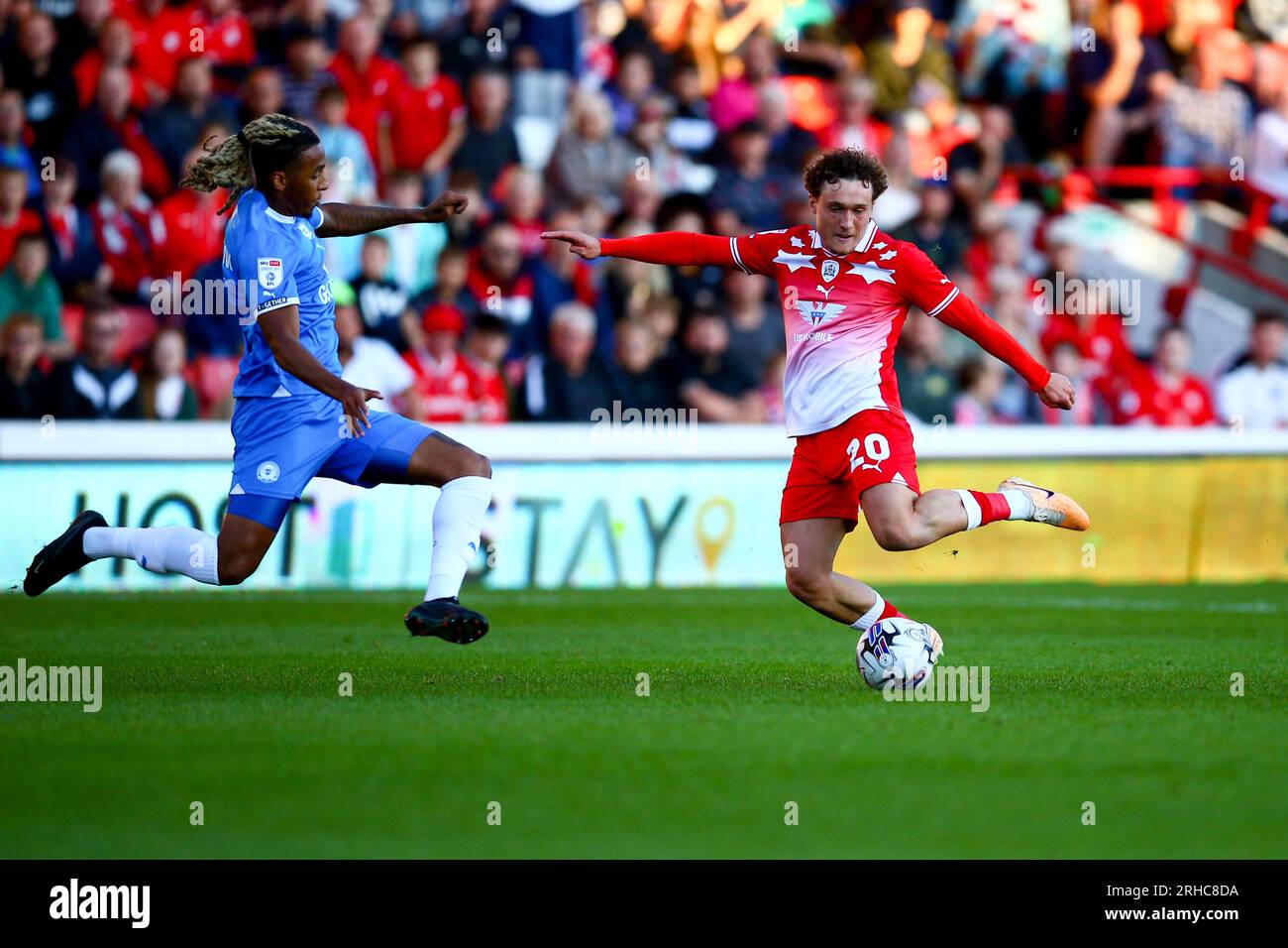 Two footed tackle hi-res stock photography and images - Alamy