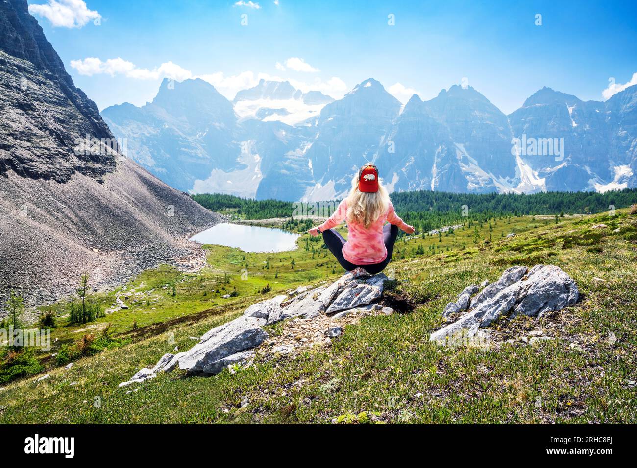 Larch Valley Hike, Woman meditating, enjoying beautiful Mountain Nature ...