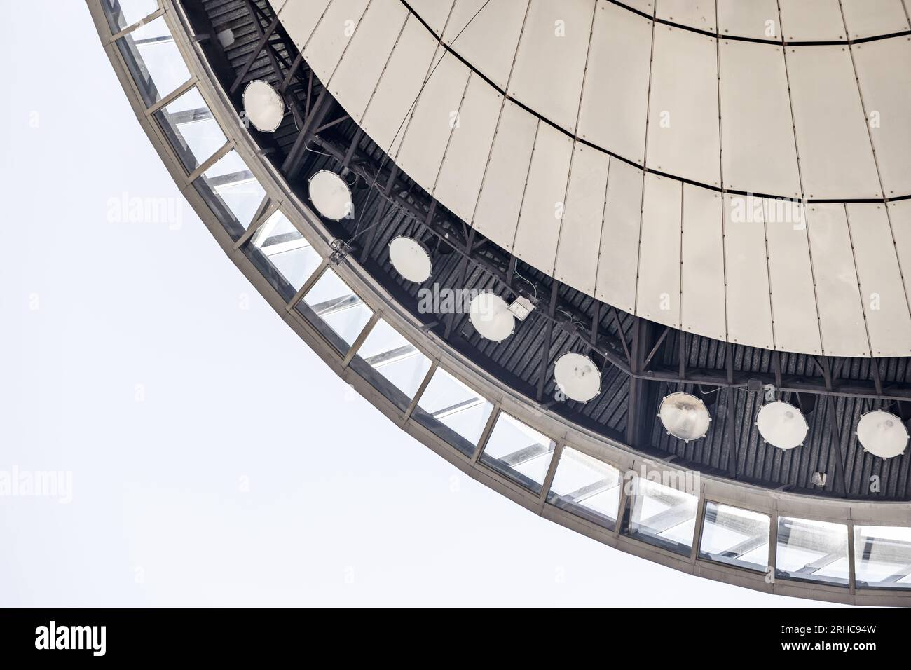 Circular metal and glass structure of the Moncloa lighthouse in Madrid ...