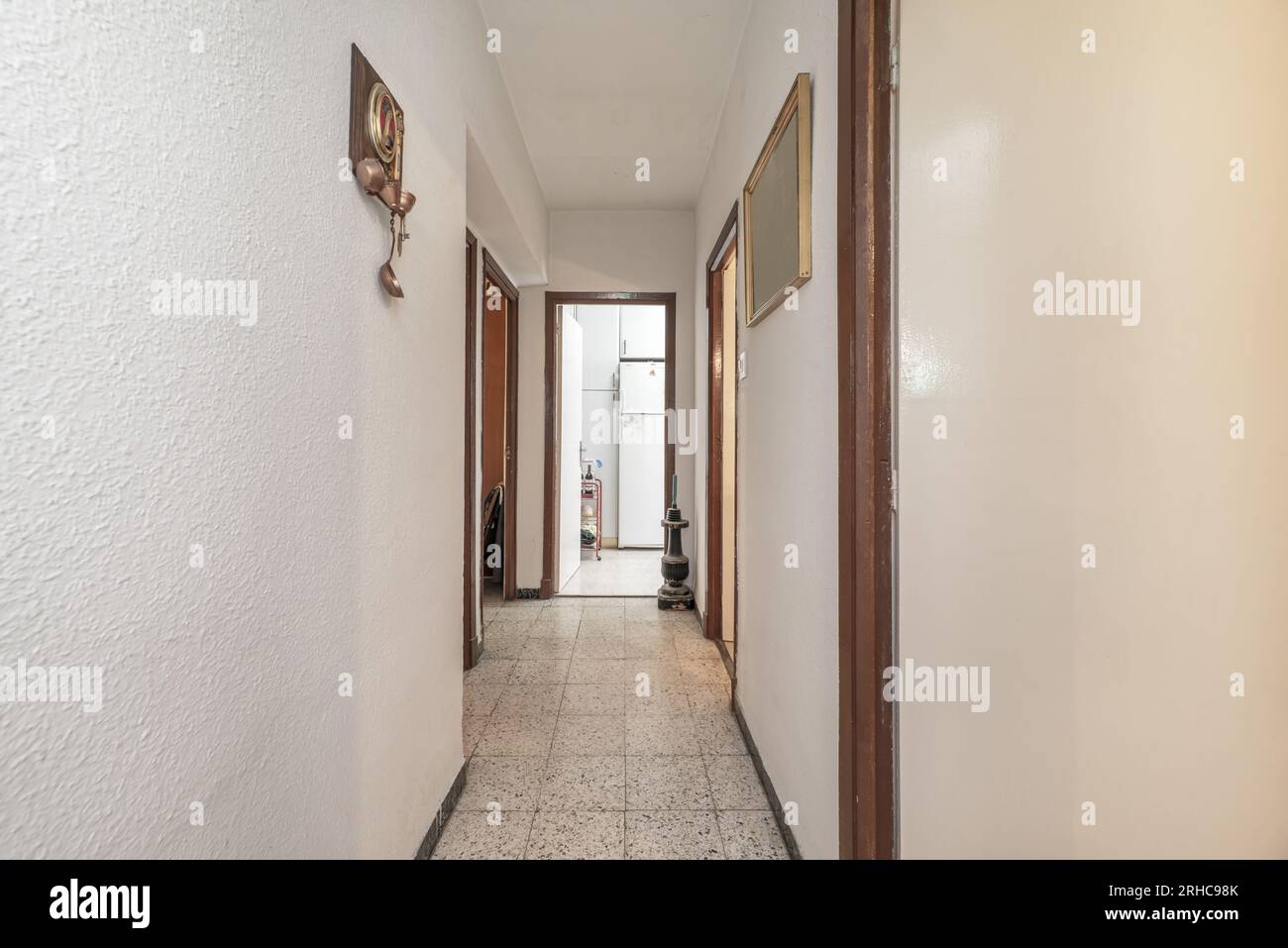 Distributor corridor of a house with access doors to rooms made of ...
