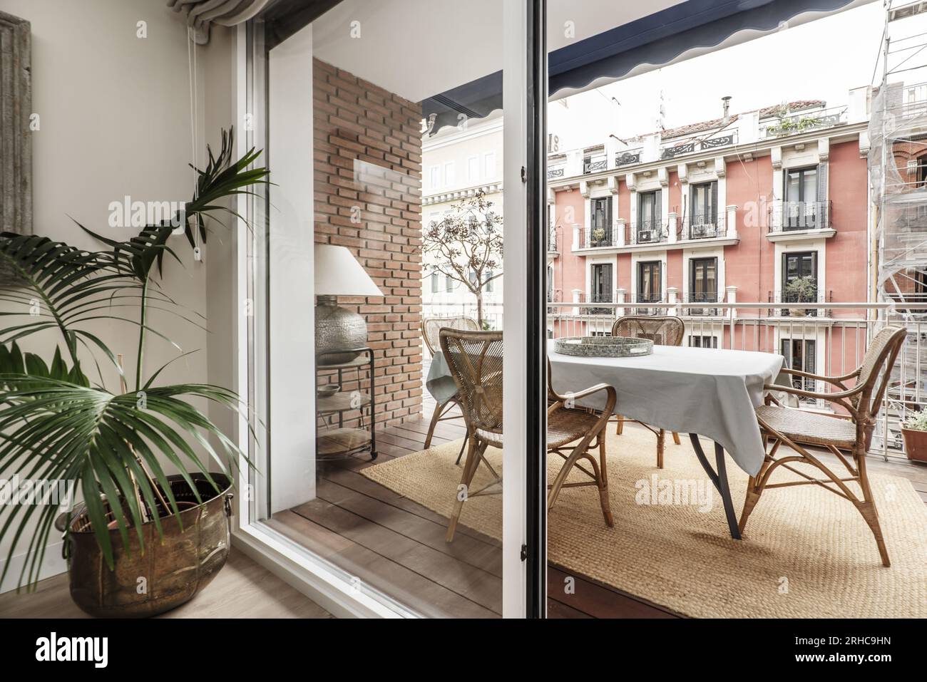 Terrace of a residential house in a vintage building with acacia wood ...