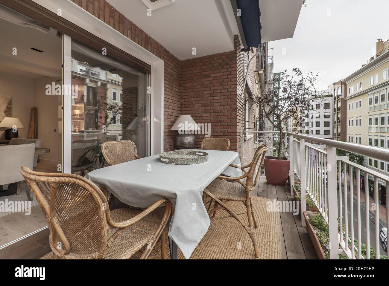 Terrace of a residential house in an old building with acacia wood ...