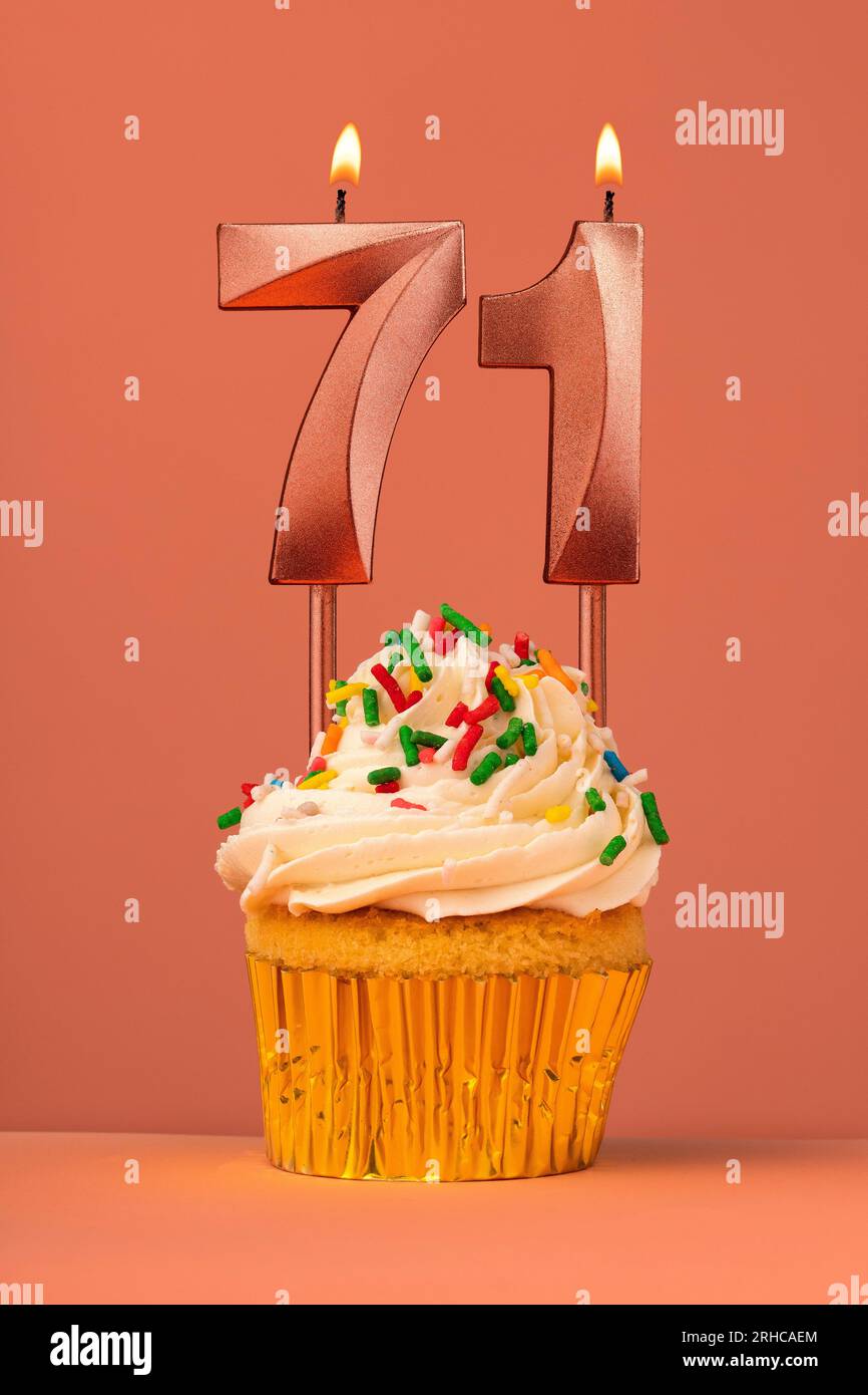 Birthday cake with candle number 71 - Coral fusion background Stock ...