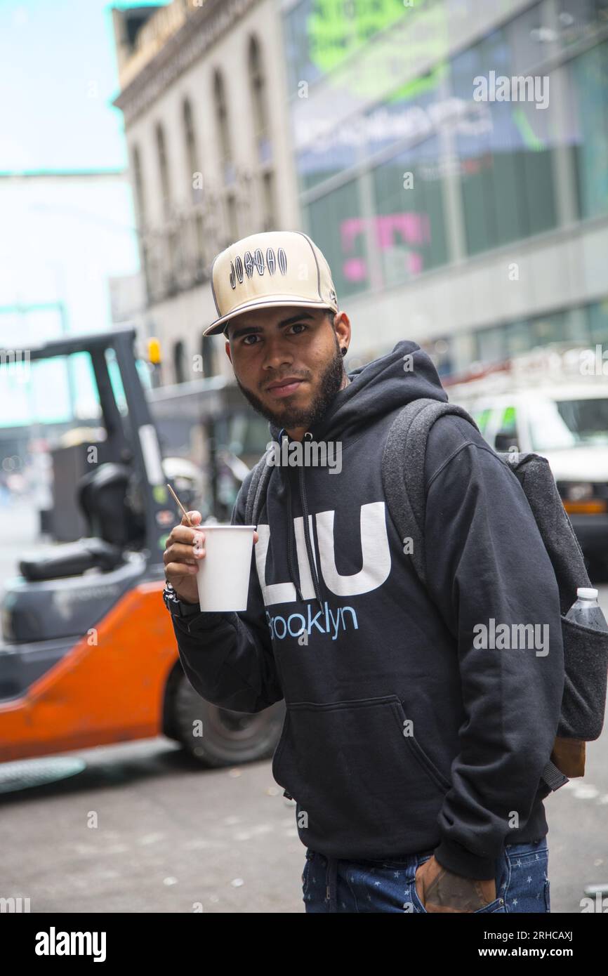 Portrait of an Hispanic college student in Times Square, New York City ...