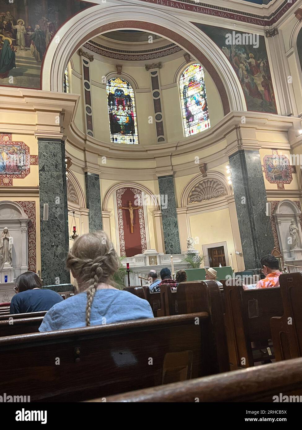 Woman church pew hi-res stock photography and images - Alamy