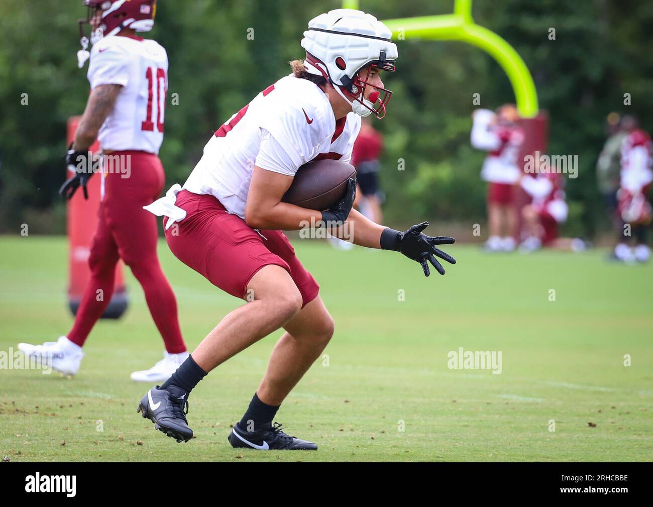 Washington Commanders tight end Cole Turner (85) running some drills on ...