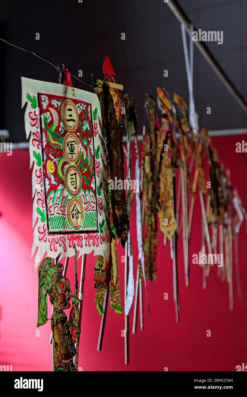 Shadow play puppet props -- army flag, closeup of photo Stock Photo - Alamy