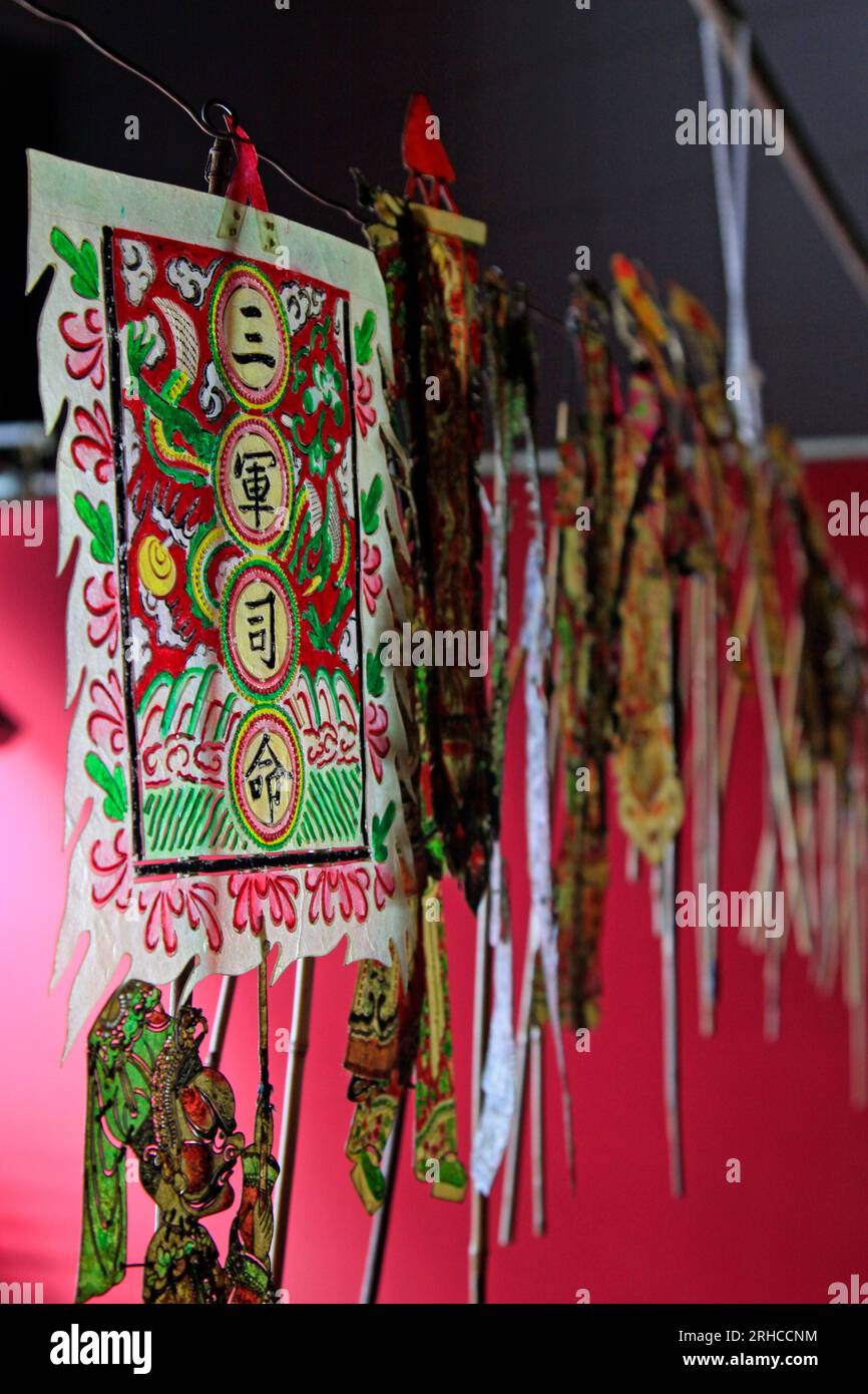 Shadow play puppet props -- army flag, closeup of photo Stock Photo - Alamy