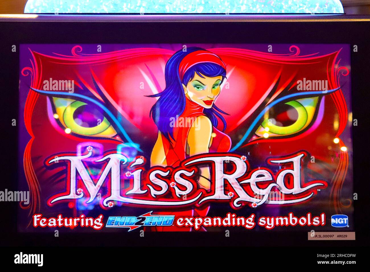 Illuminated header panel with stylised graphics mounted on an Arcade ...