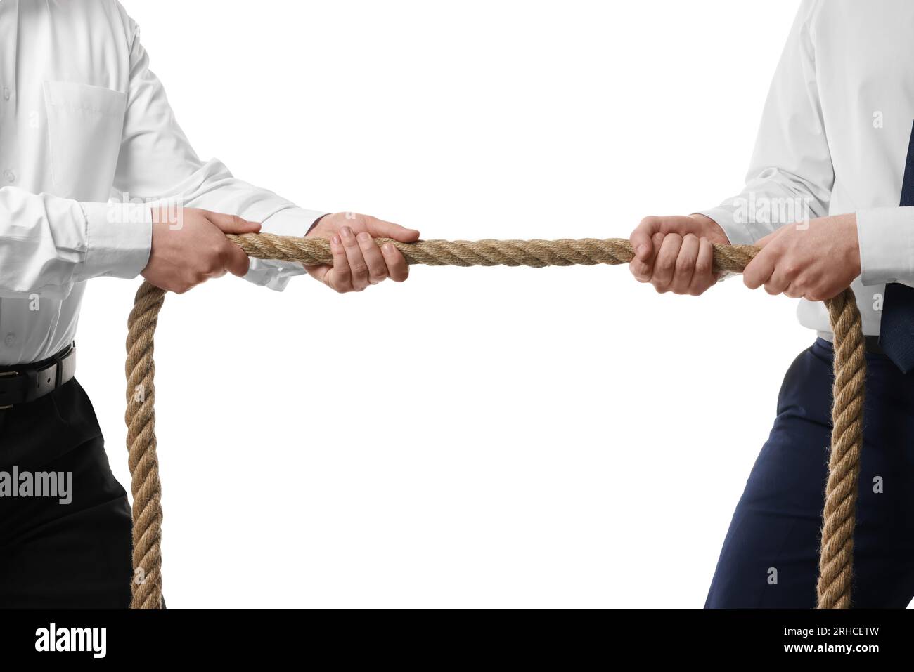Dispute concept. Men pulling rope on white background, closeup Stock ...