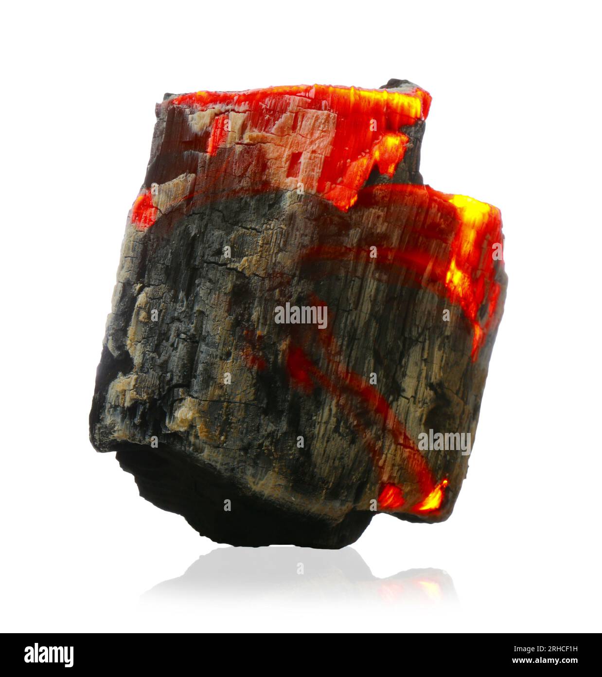 Piece of smoldering coal isolated on white Stock Photo - Alamy