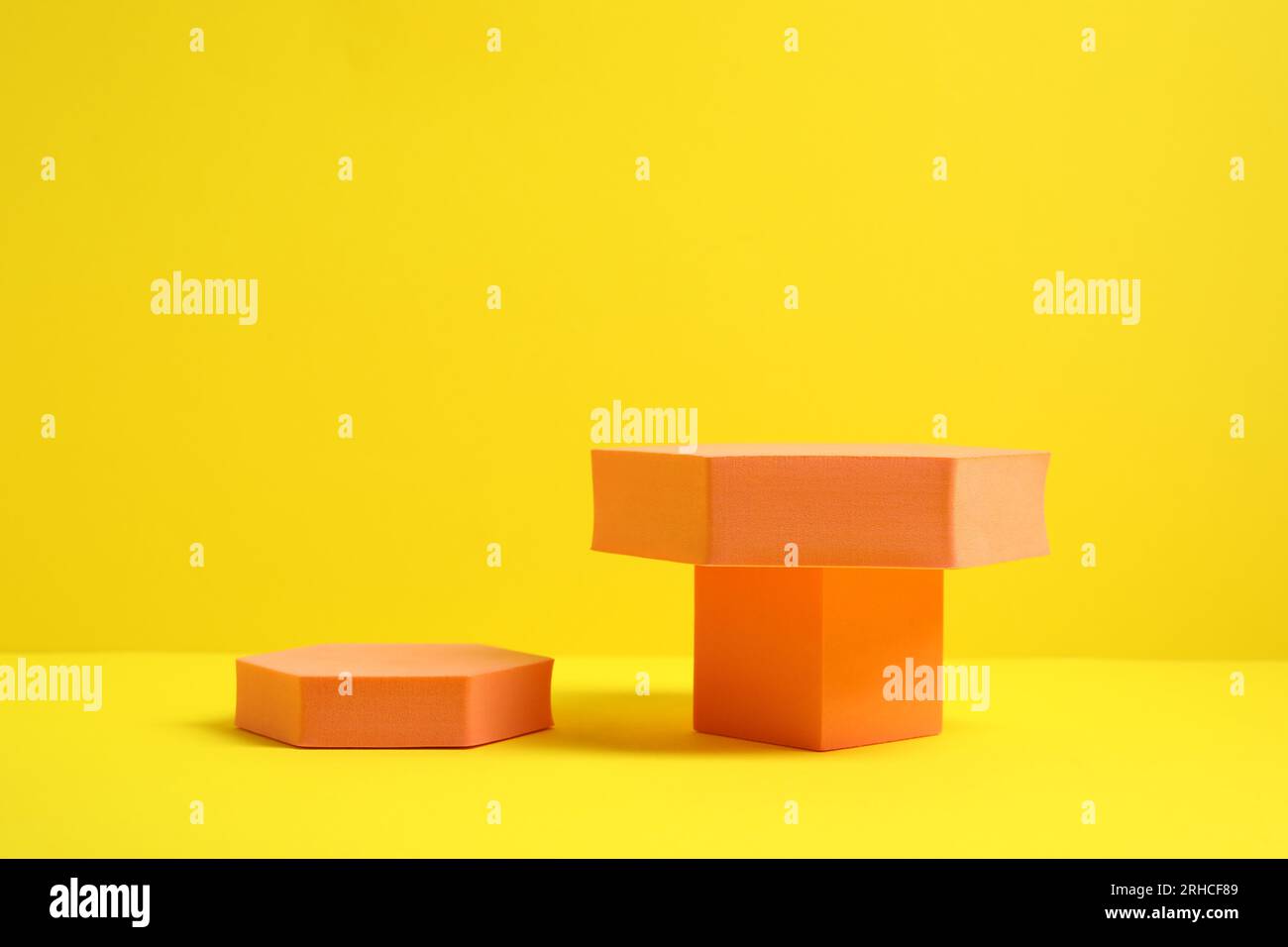 Many orange geometric figures on yellow background. Stylish ...