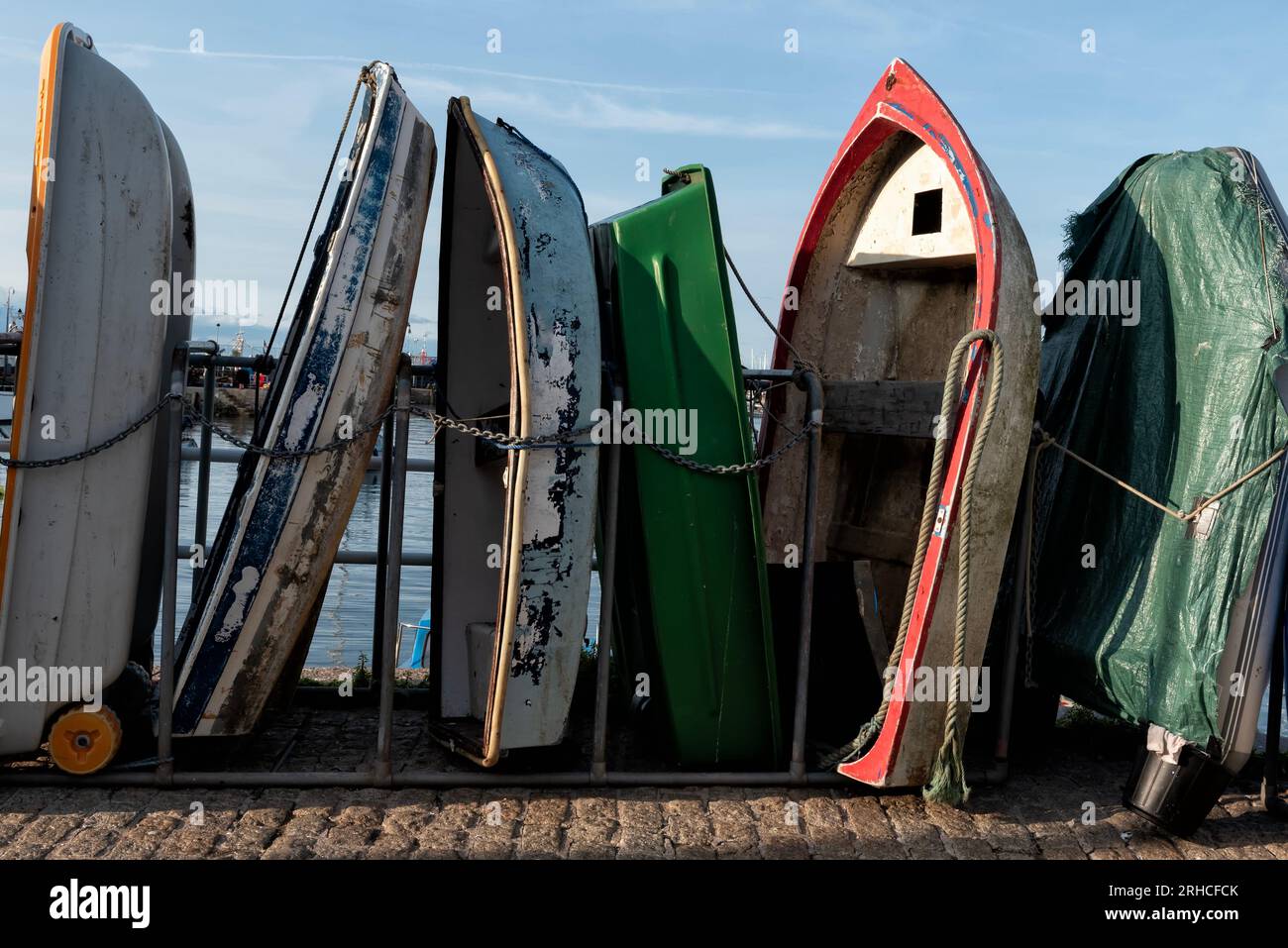 Small boats by the harbour Stock Photo - Alamy