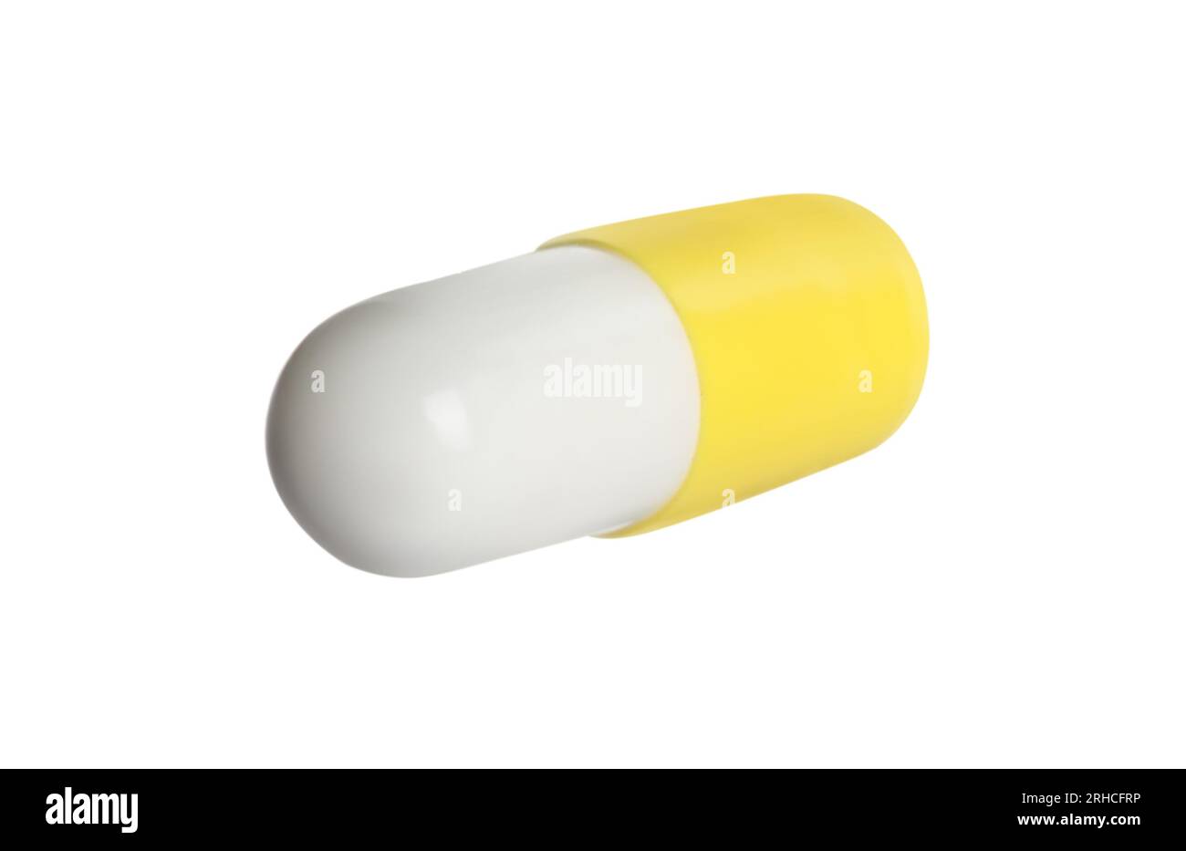 One pill isolated on white. Medicinal treatment Stock Photo - Alamy