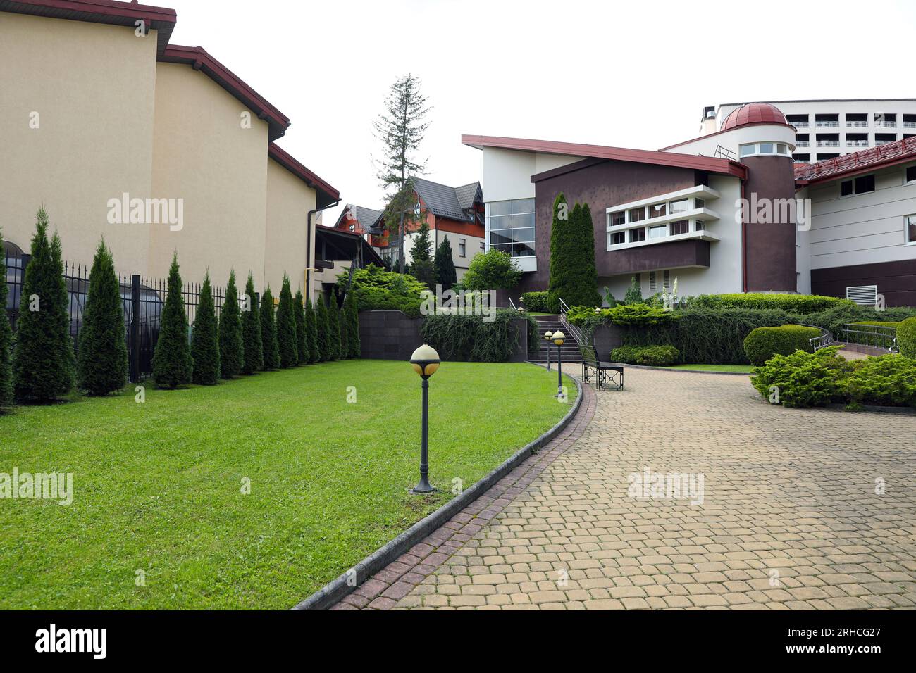 View of beautiful buildings and green plants in residential area ...