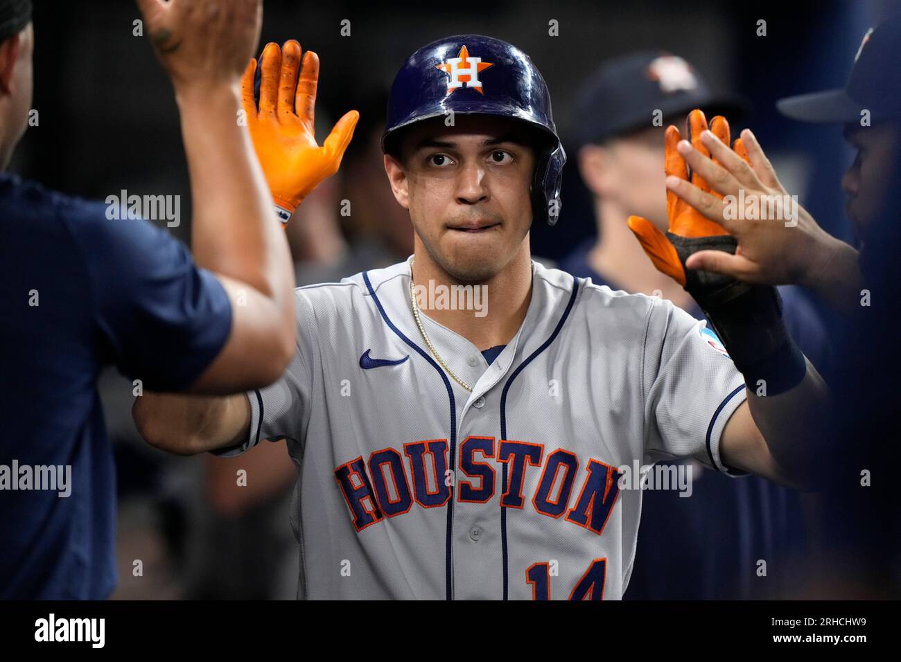 Houston Astros' Mauricio Dubon is congratulated by teammates after he ...