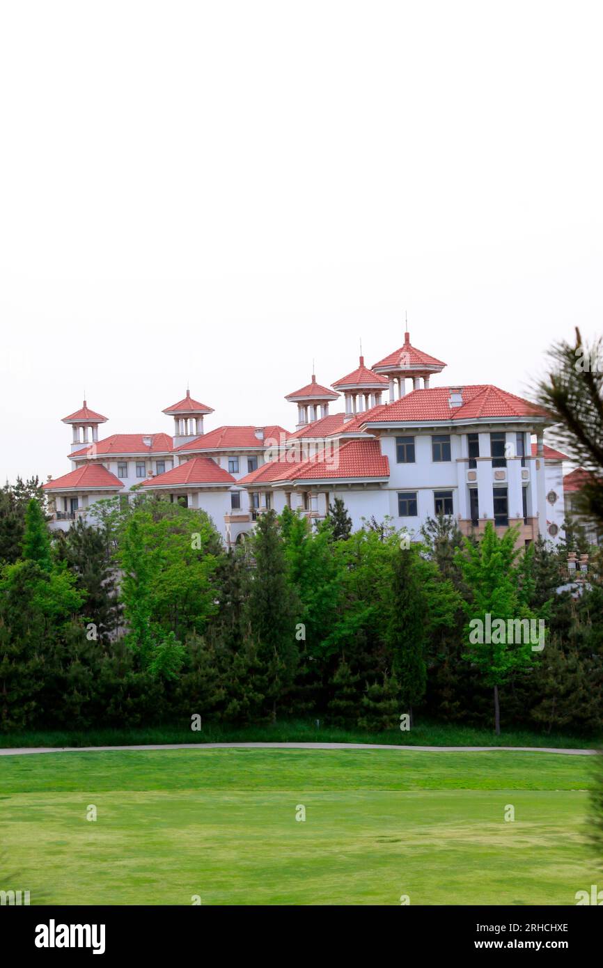 red-roofed buildings in a park, china Stock Photo - Alamy
