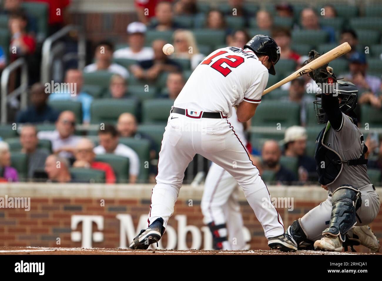 Atlanta Braves' Sean Murphy his hit by a pitch during the first inning ...