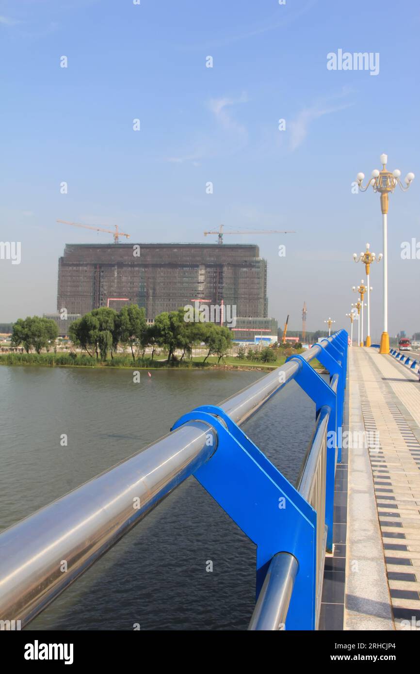 metal bridge railings and unfinished building, north china Stock Photo ...