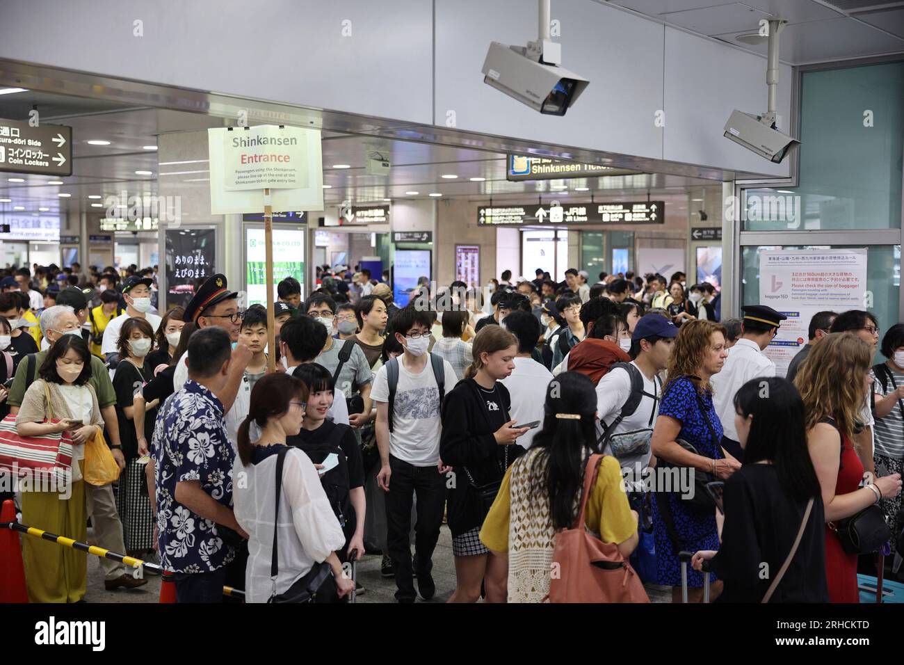 Passengers are seen at ticket gates of Shinkansen Bullet Train that ...