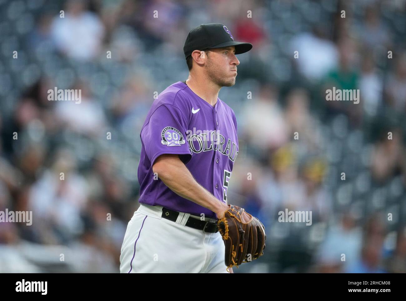 Colorado Rockies starting pitcher Ty Blach reacts after giving up a two ...