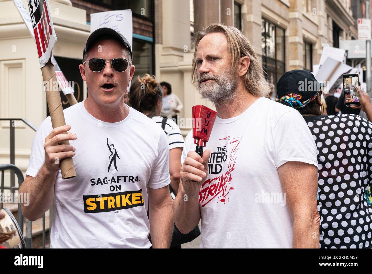 New York, USA. 15th Aug, 2023. Lee Tergesen (R) joined WGA and SAG ...