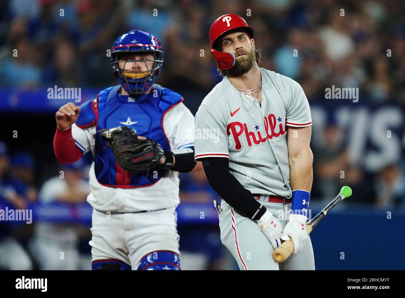 Philadelphia Phillies designated hitter Bryce Harper (3) reacts after striking out as Toronto ...