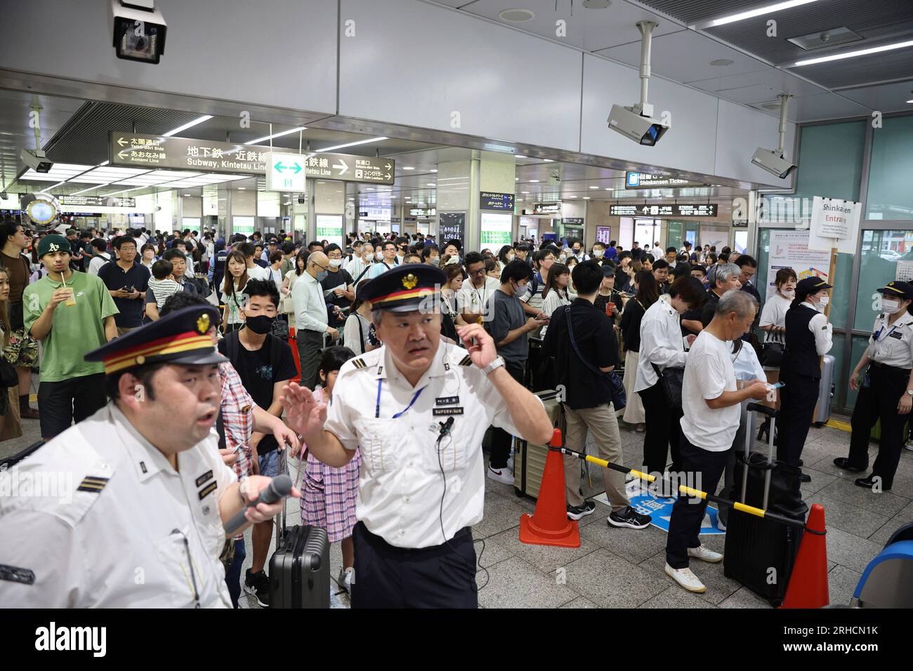 Passengers are seen at ticket gates of Shinkansen Bullet Train that ...
