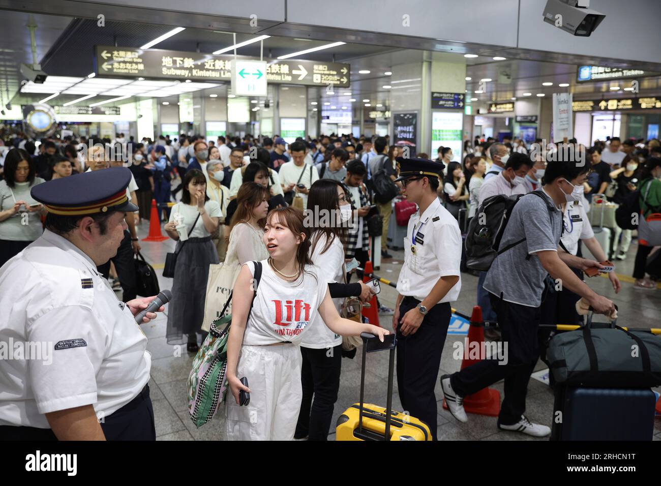 Passengers are seen at ticket gates of Shinkansen Bullet Train that ...