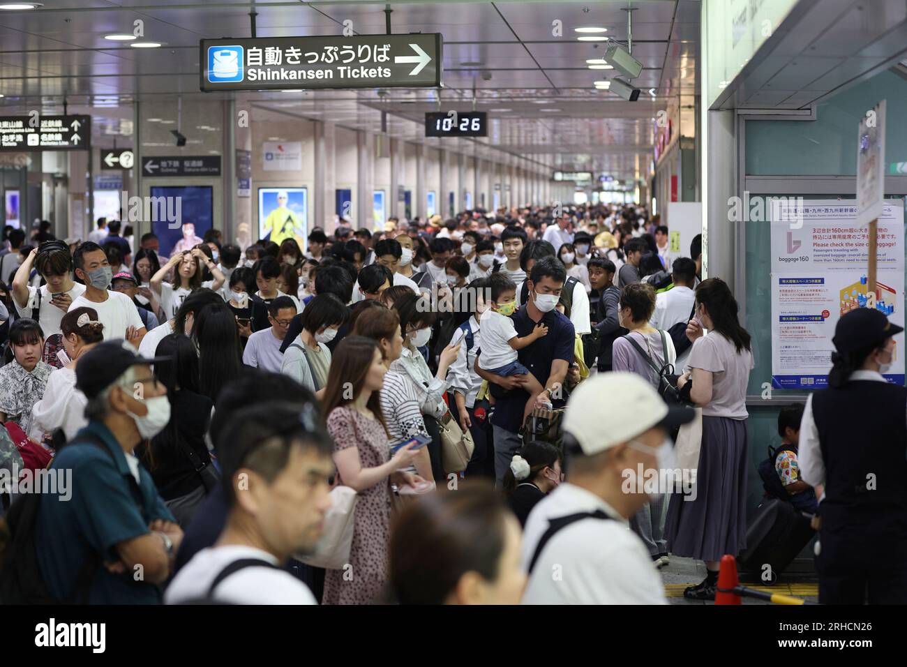Passengers are seen at ticket gates of Shinkansen Bullet Train that ...