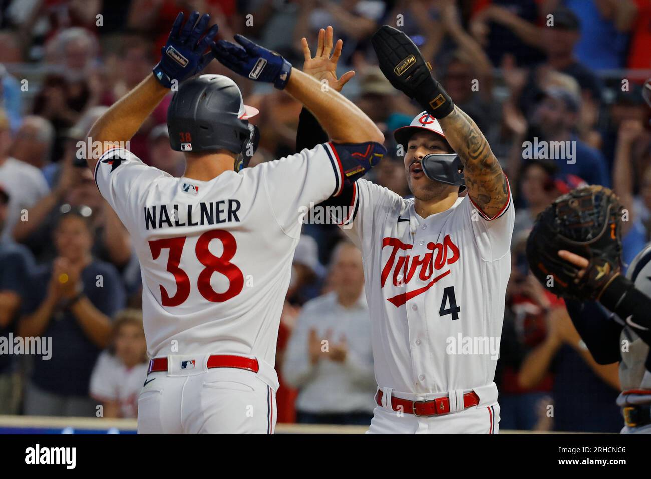 Minnesota Twins' Carlos Correa (4) greets Matt Wallner (38) after they ...
