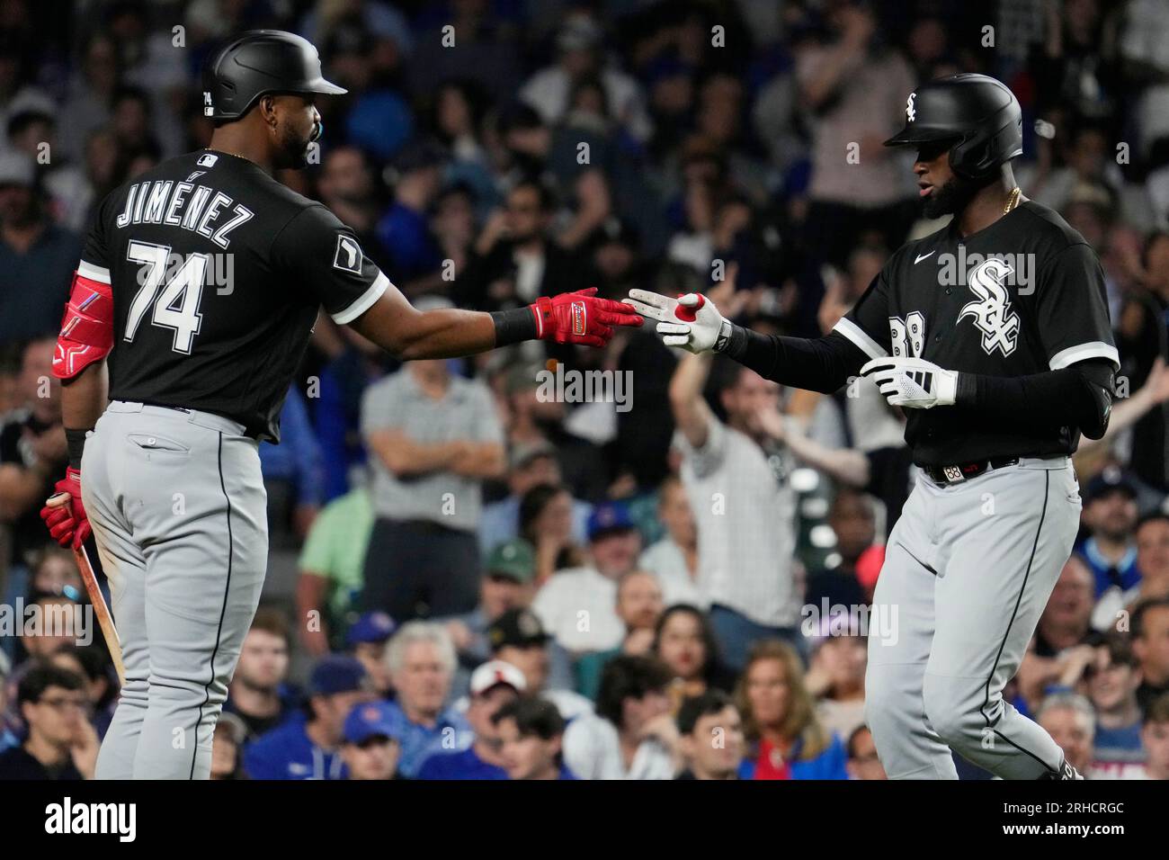 Chicago White Sox's Luis Robert Jr., right, celebrates with Eloy ...