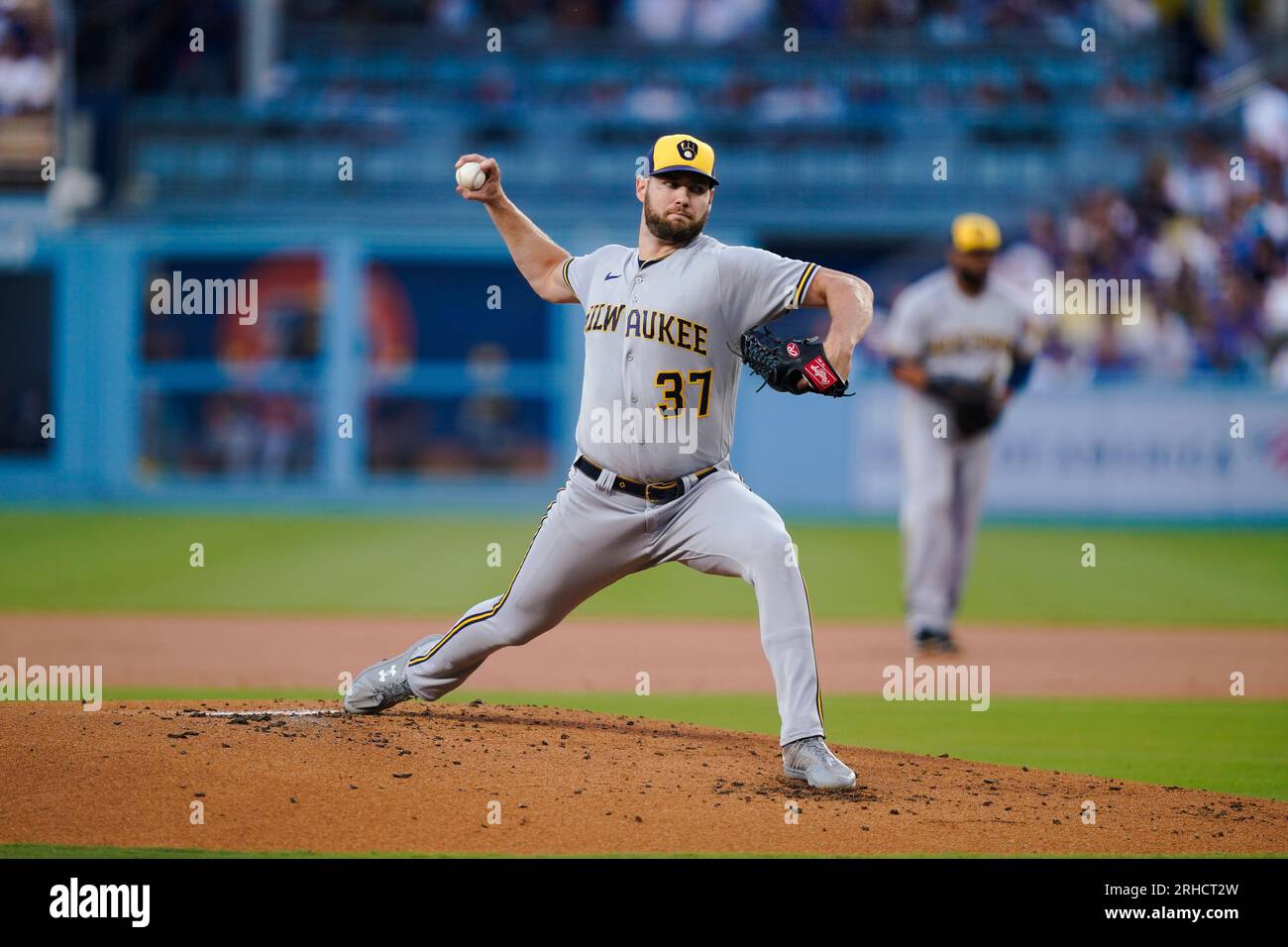 Milwaukee Brewers starting pitcher Adrian Houser throws during the ...